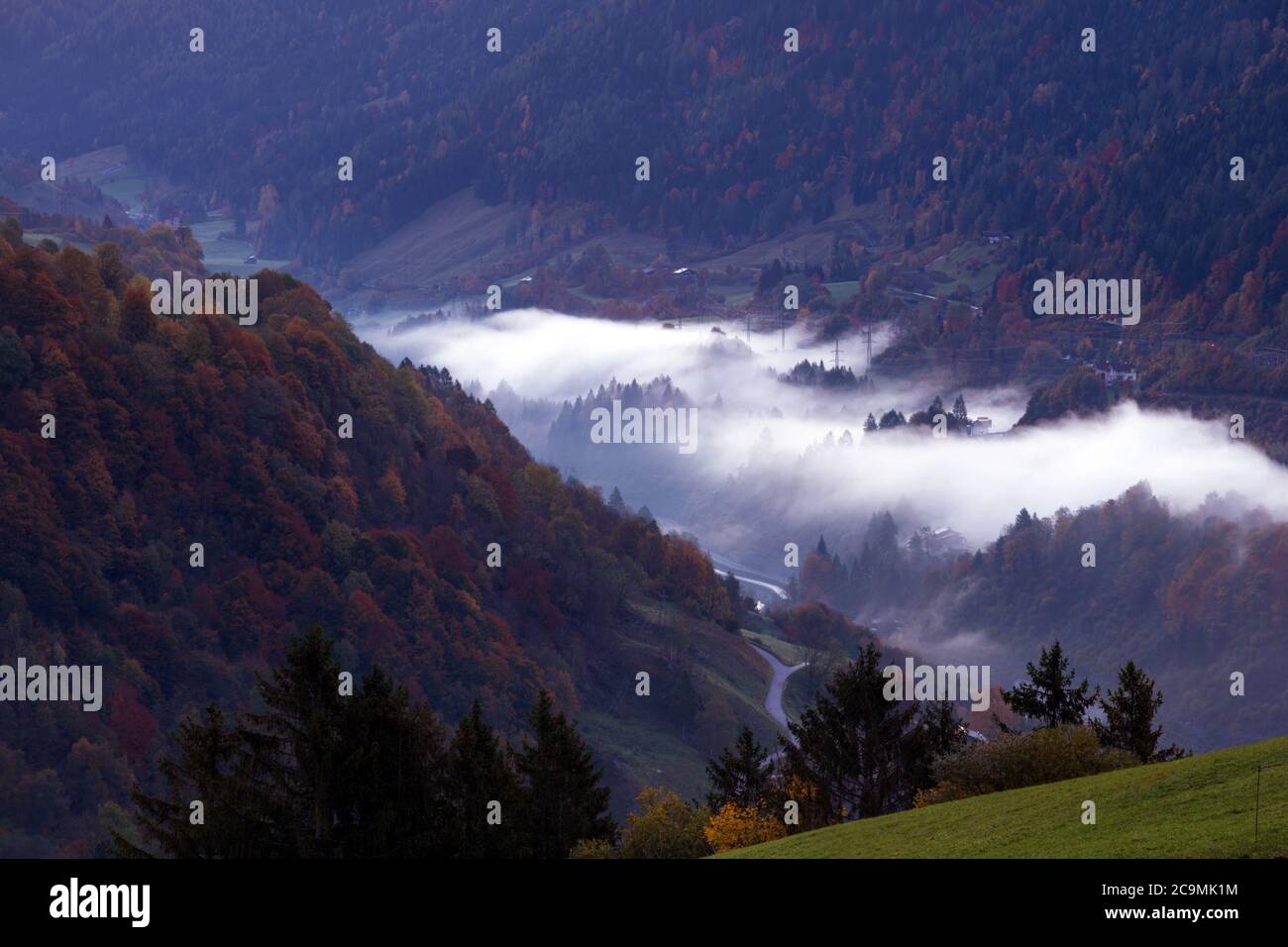 beautiful view of the valley with fog. autumn landscape in the Austrian ...
