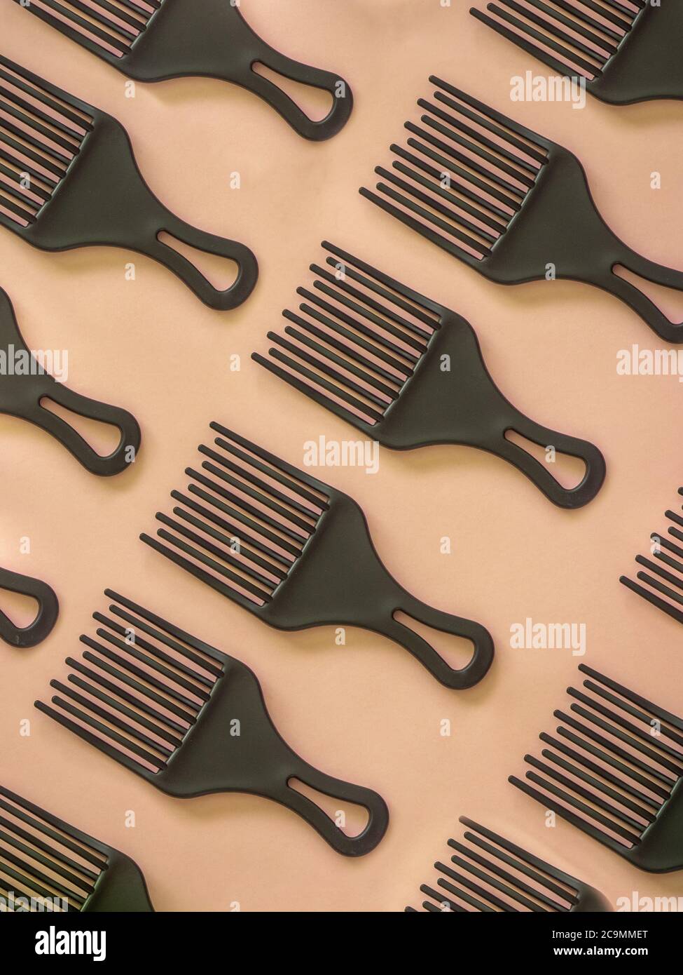 Curl comb pattern on cream background Stock Photo - Alamy