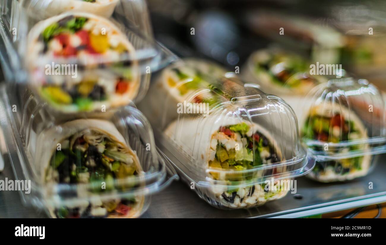 Pre-packaged sandwiches displayed in a commercial refrigerator Stock ...