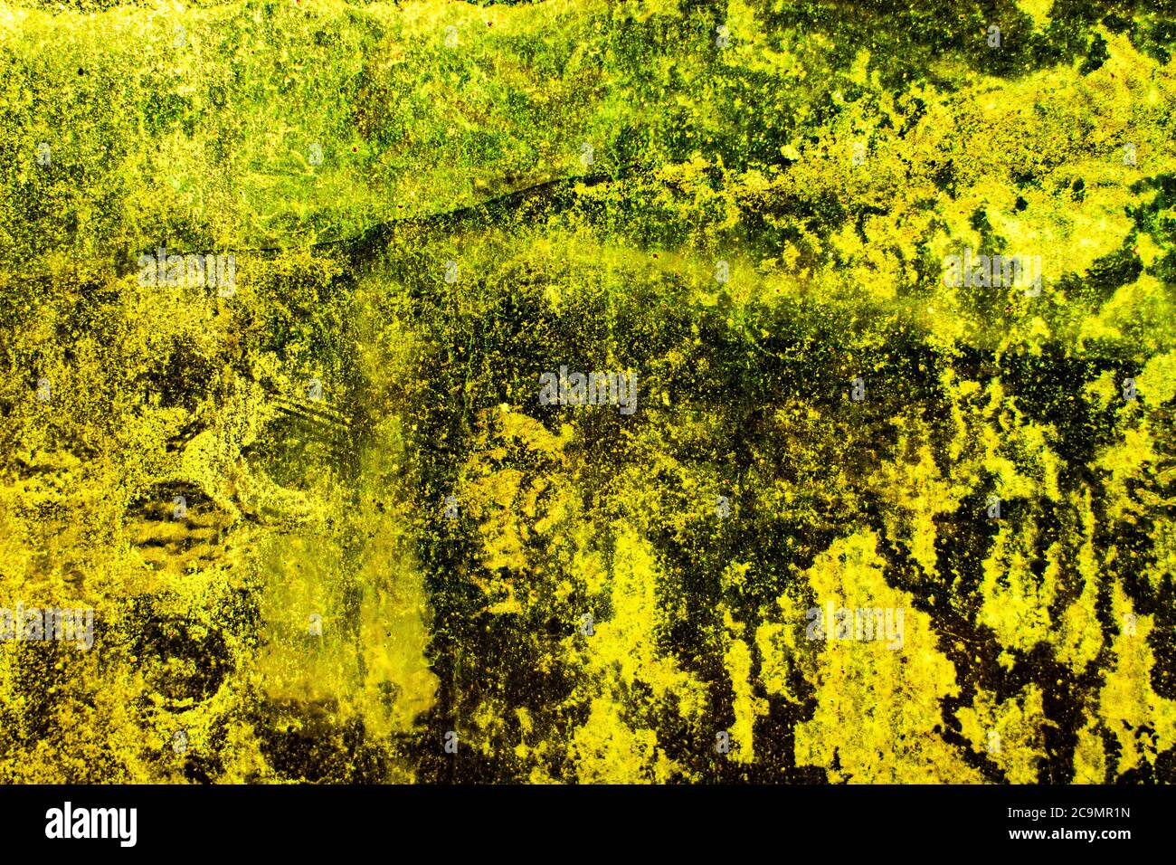 Yellow colored abstract wall background with textures of different ...