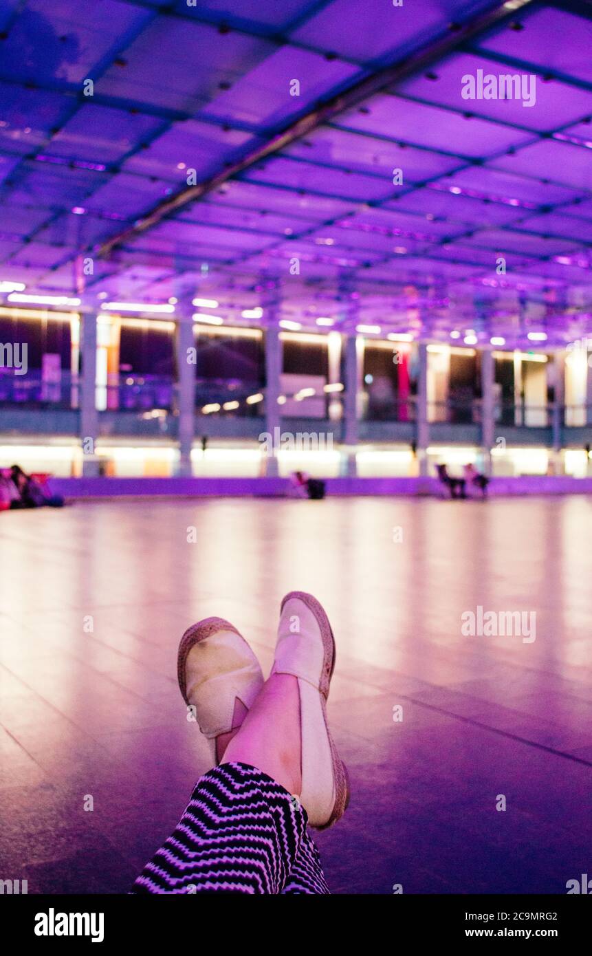 Female feet in espadrilles resting with a background of an argentinian ...