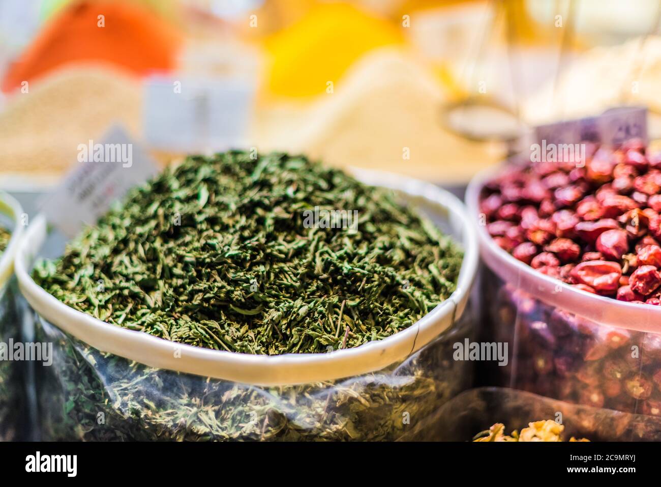 Variety of spices and herbs on the arab street market stall. Souq Waqif ...