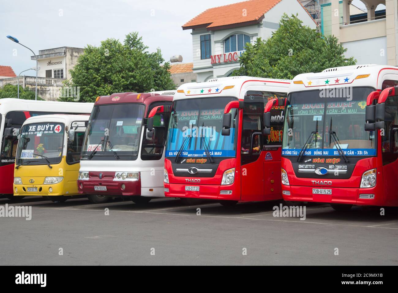 VUNG TAU, VIETNAM - DECEMBER 23, 2015: Four long-distance bus at the ...