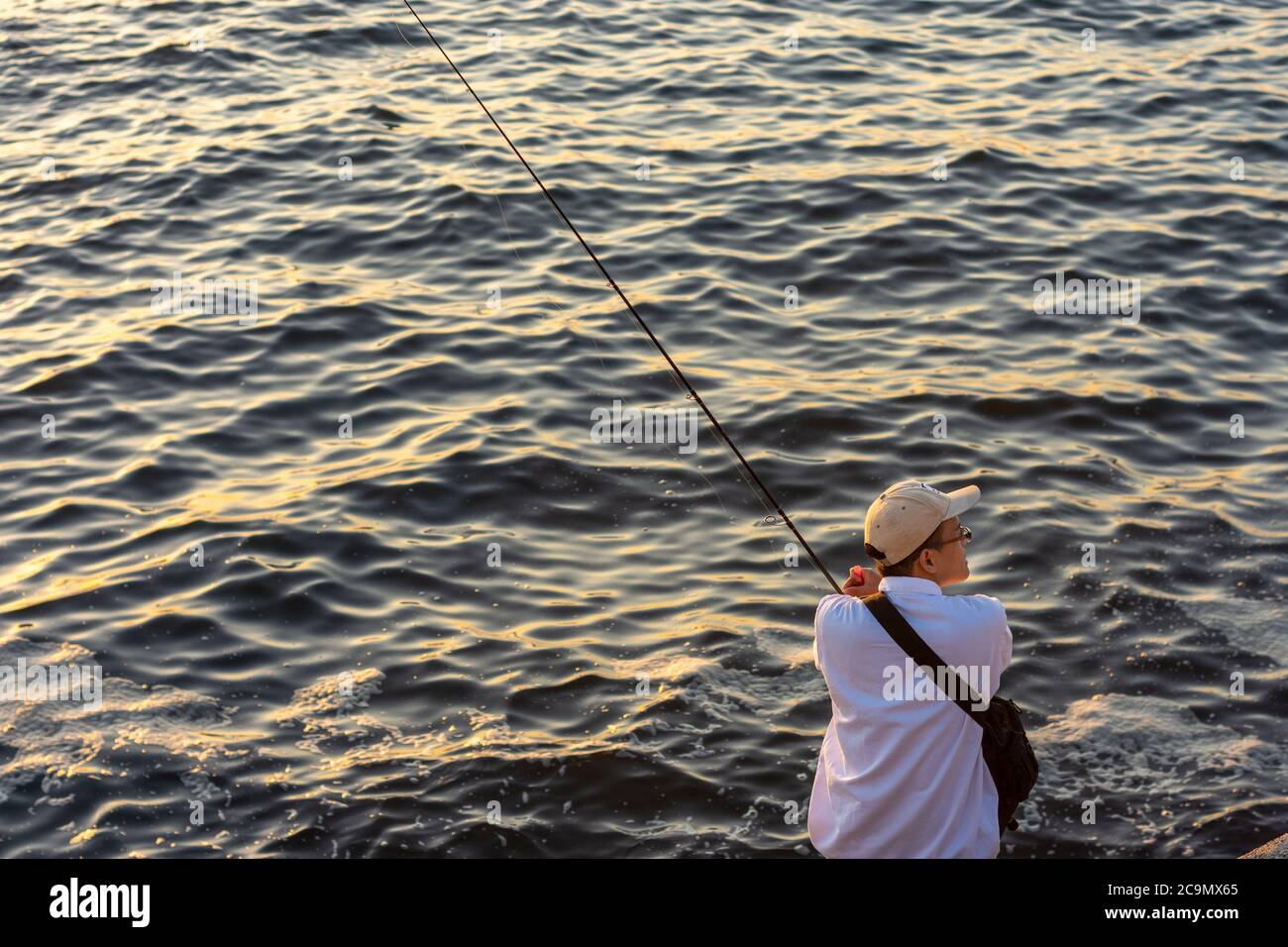 Osaka / Japan - September 30, 2017: Japanese man with a fishing rod ...