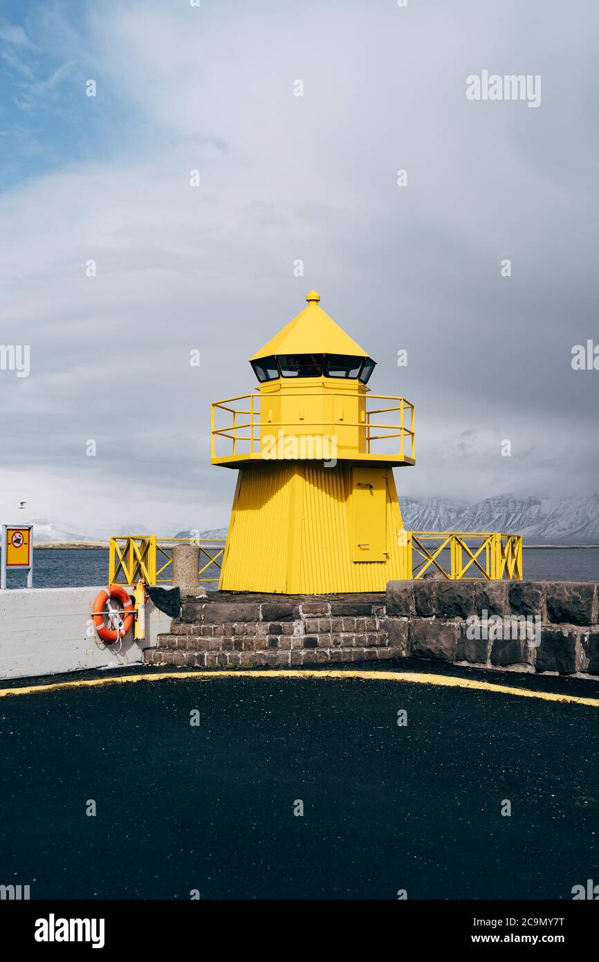A large yellow lighthouse in Iceland, Reykjavik Stock Photo - Alamy
