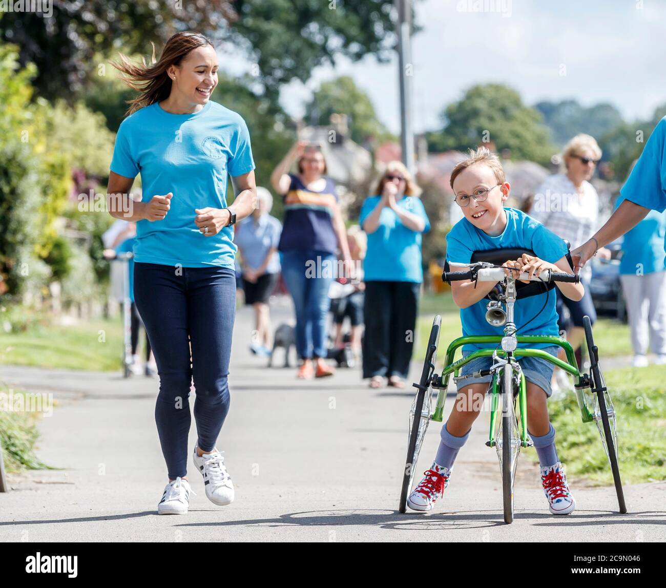 Tobias Weller, who has cerebral palsy and autism, alongside Olympic ...