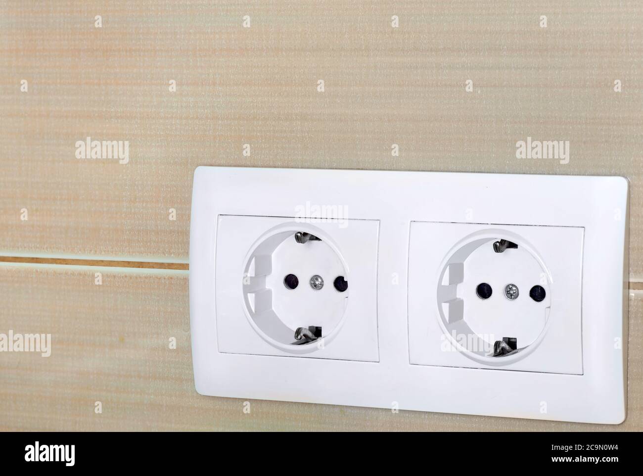 the electric socket of 220 volts, the double socket from white plastic ...