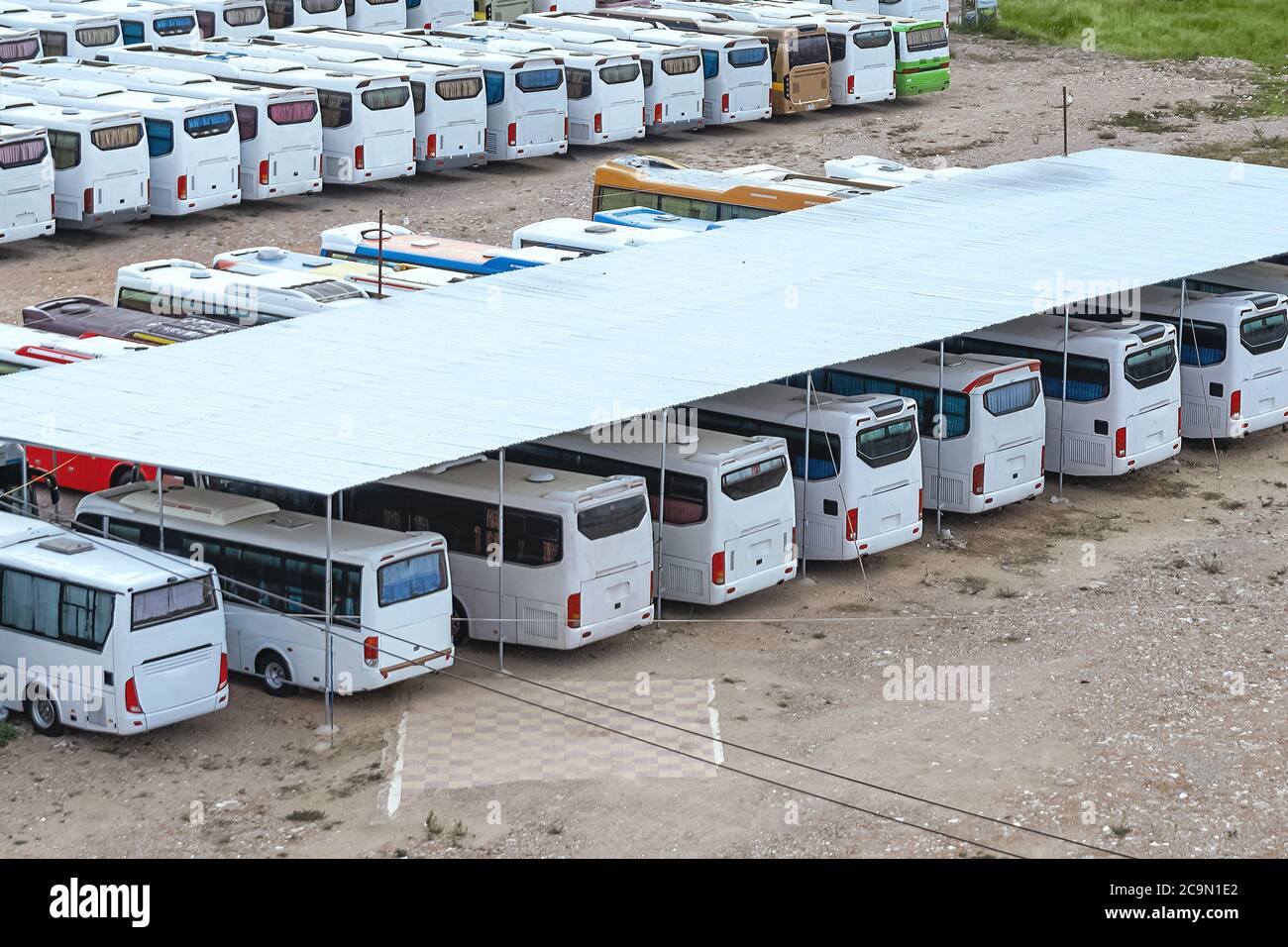 Many buses in the open parking. Lack of demand for public transport ...