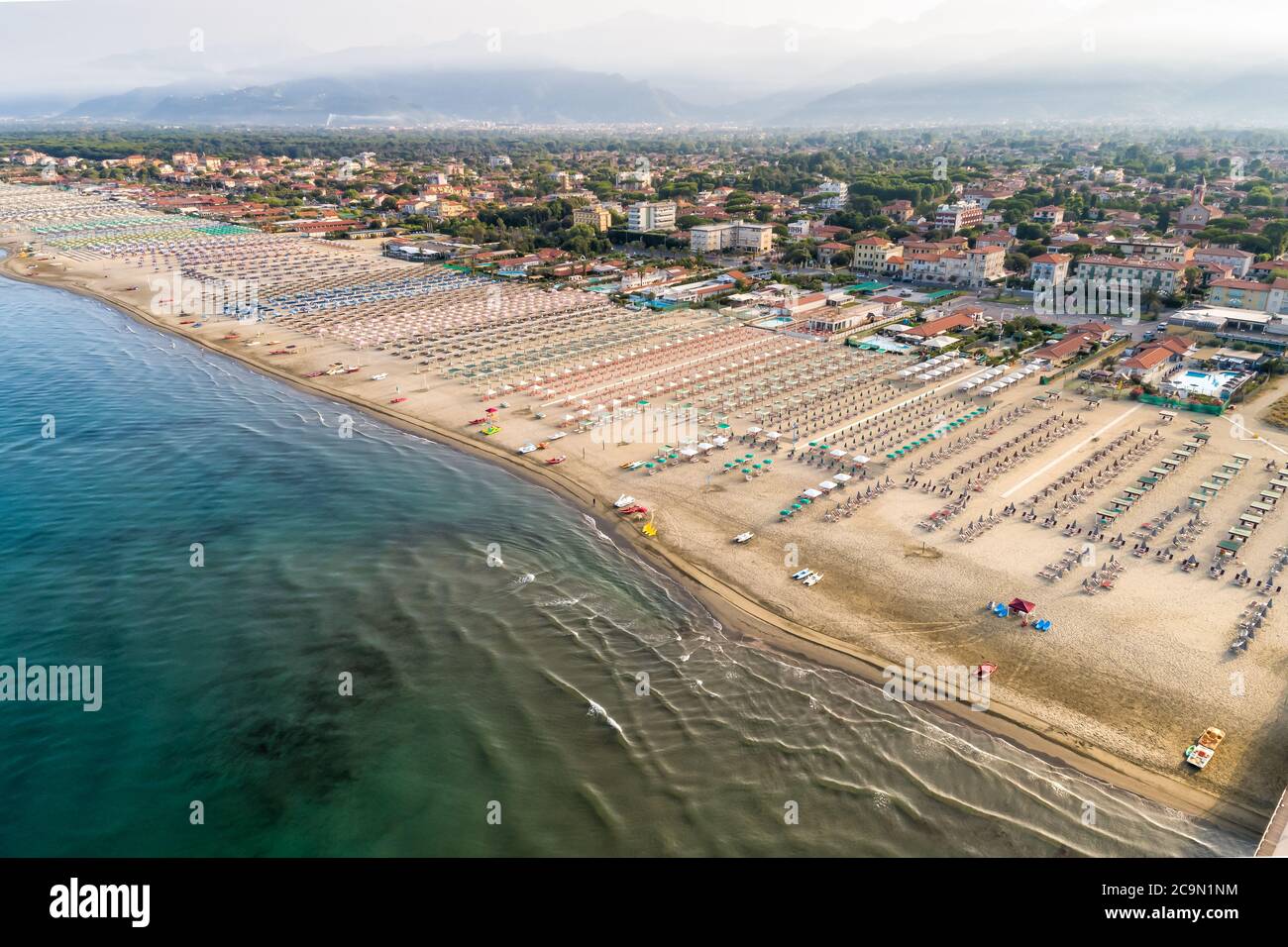 Aerial view of the Marina di Pietrasanta beach in the early morning in ...