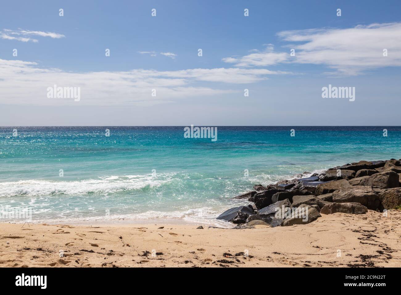 The turquoise sea and sandy beach on the island of Barbados Stock Photo ...
