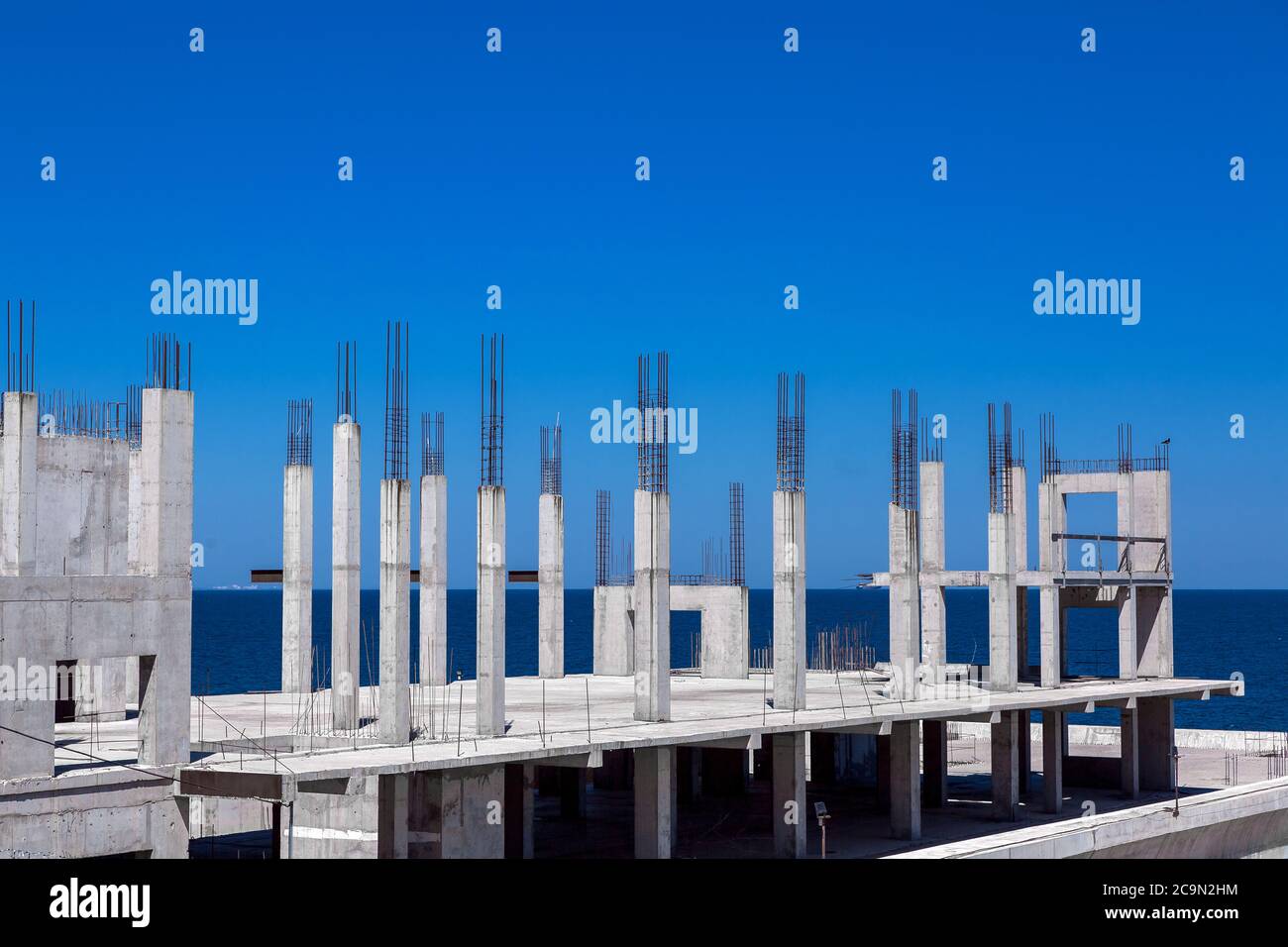 building base with support under construction, against background of ...