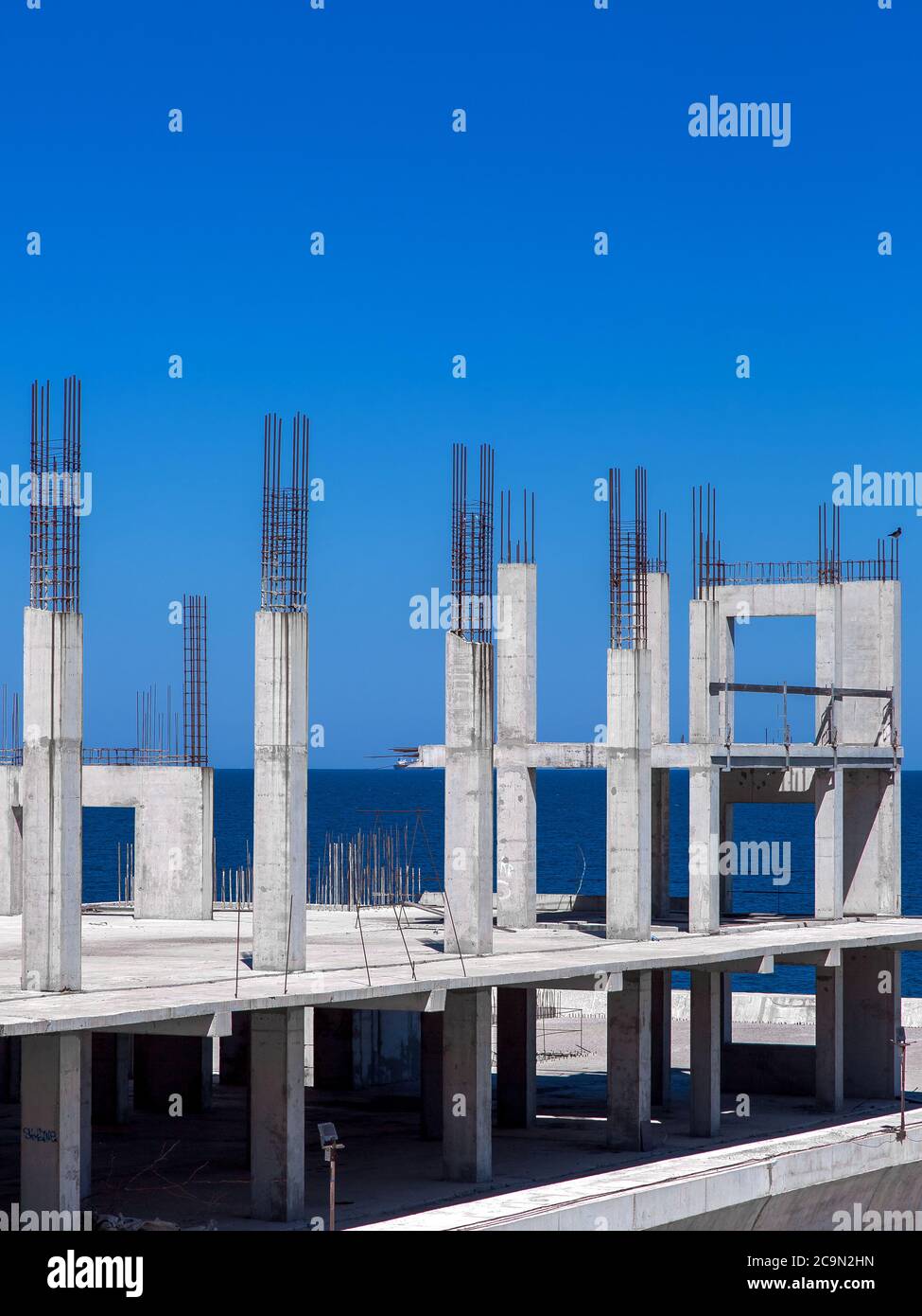 building base with support under construction, against background of ...