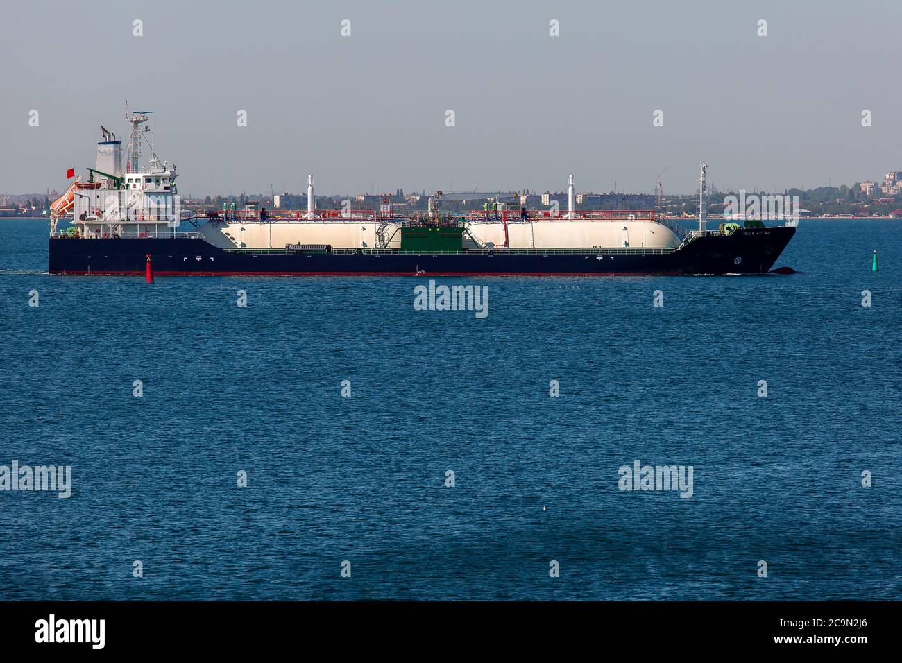 The lng ship, gas carrier vessel coming into the sea port Stock Photo ...