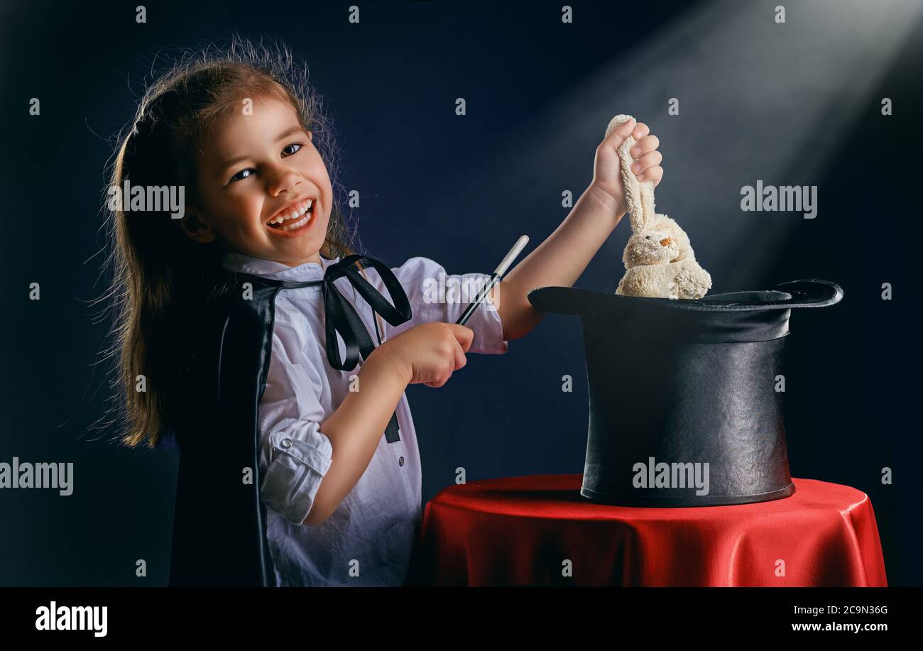 the little magician does tricks Stock Photo - Alamy