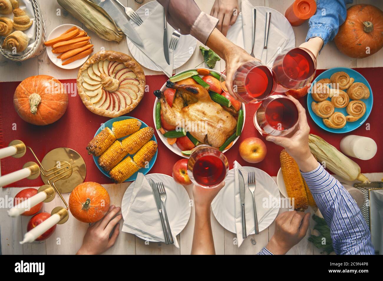 Happy Thanksgiving Day! Autumn feast. Family sitting at the table and ...