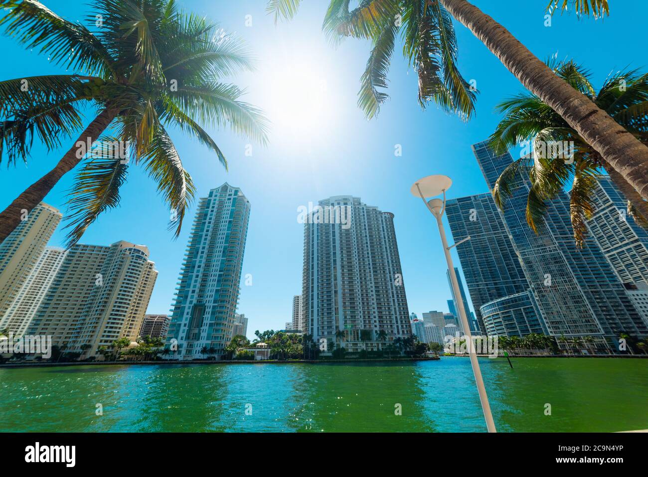 Sun shining over beautiful Miami river walk, USA Stock Photo - Alamy