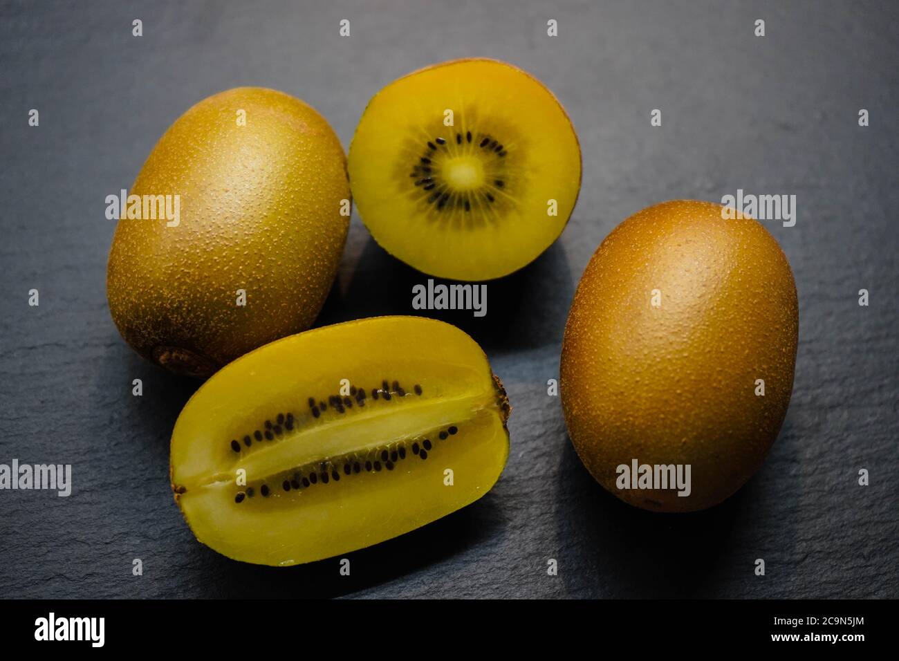 Fresh sliced golden Kiwi fruit Stock Photo - Alamy