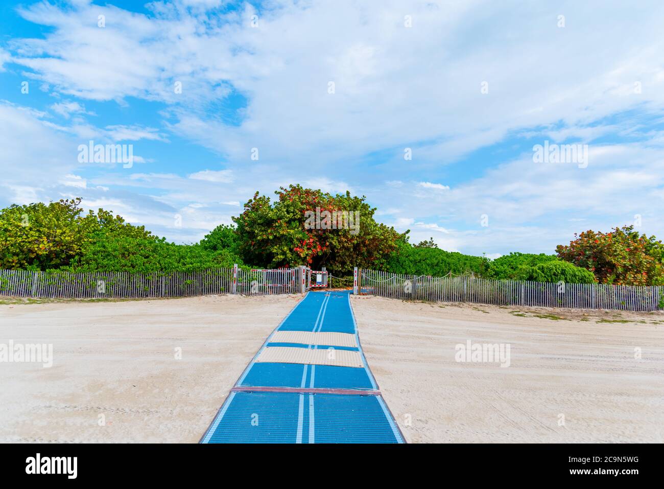 Beach access ramp for wheelchair on the sand in South Beach. Miami ...