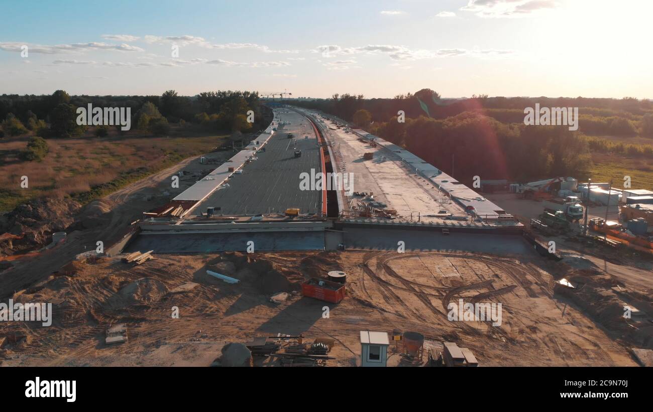 Aerial view of the heavy machinery working on the roads, Warsaw. High ...