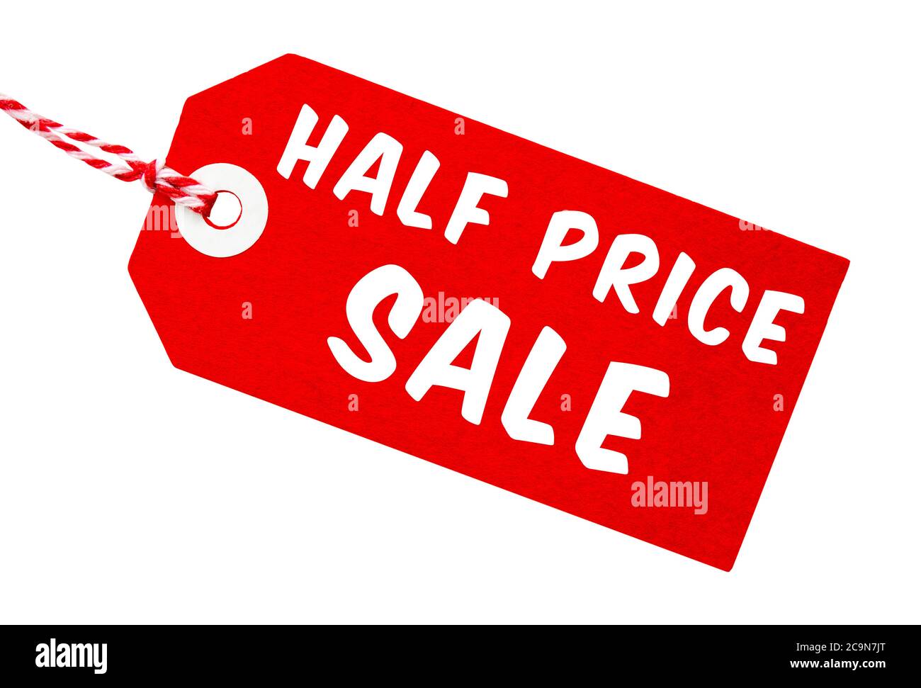 Half price sale tag made from recycled card with red and white string ...