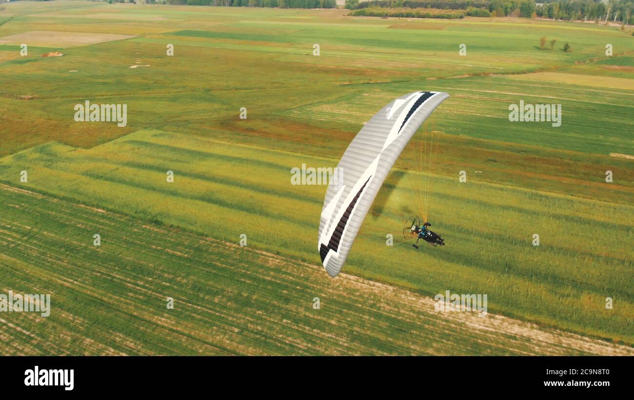 Paramotor Tandem Gliding And Flying In The Air. Copy space. High ...