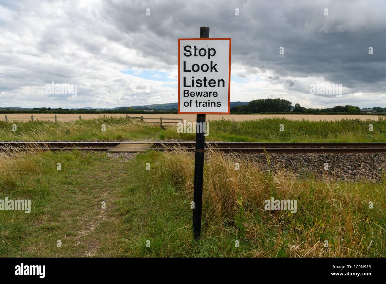 Railroad crossing safety sign Stock Photo - Alamy
