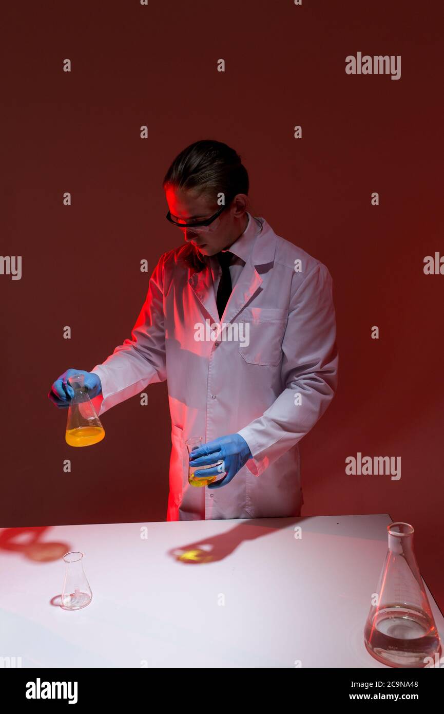 Man working pipette in hi-res stock photography and images - Alamy