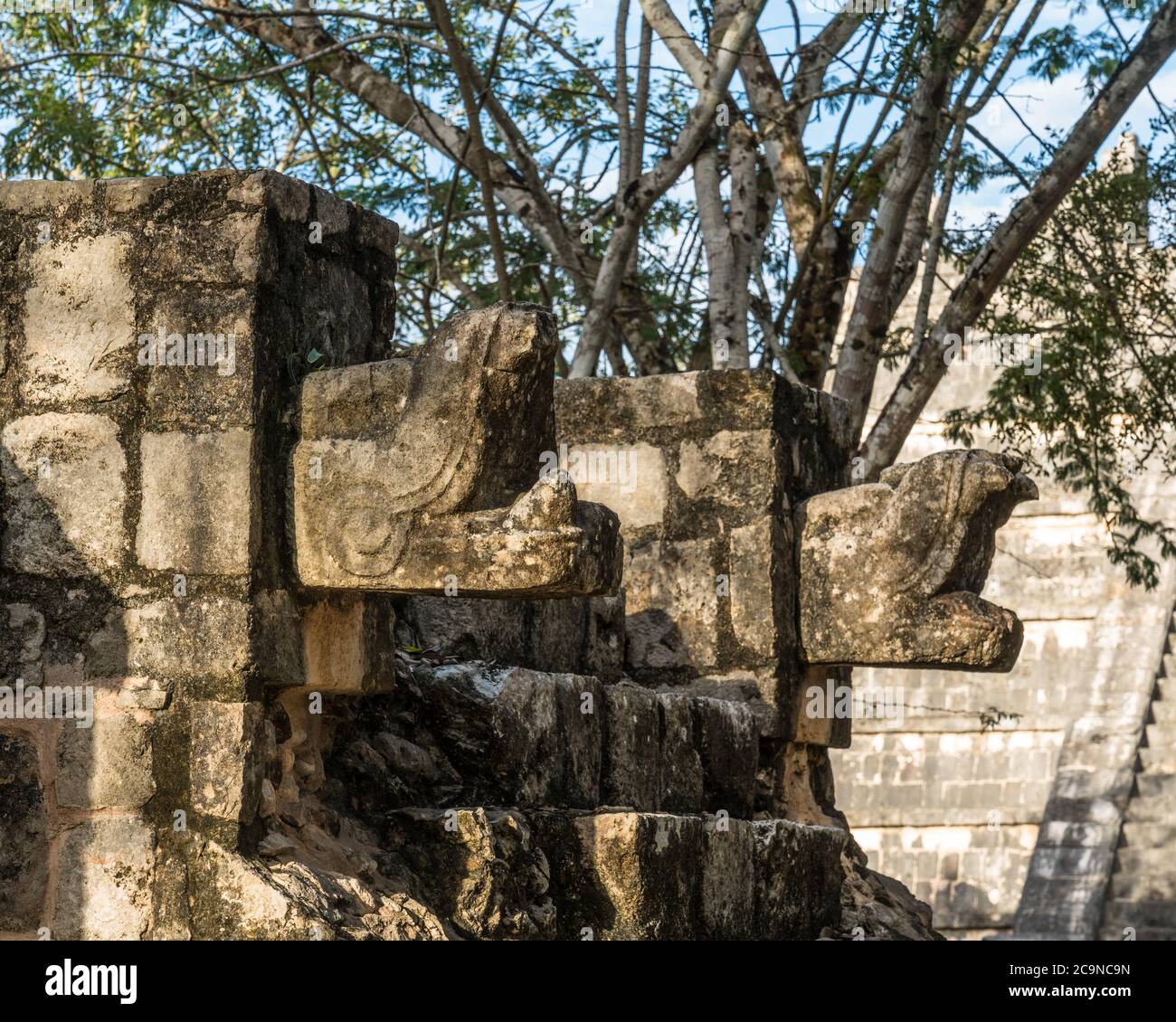 Carved stone serpent heads on the Platform of Venus in the Ossuary ...