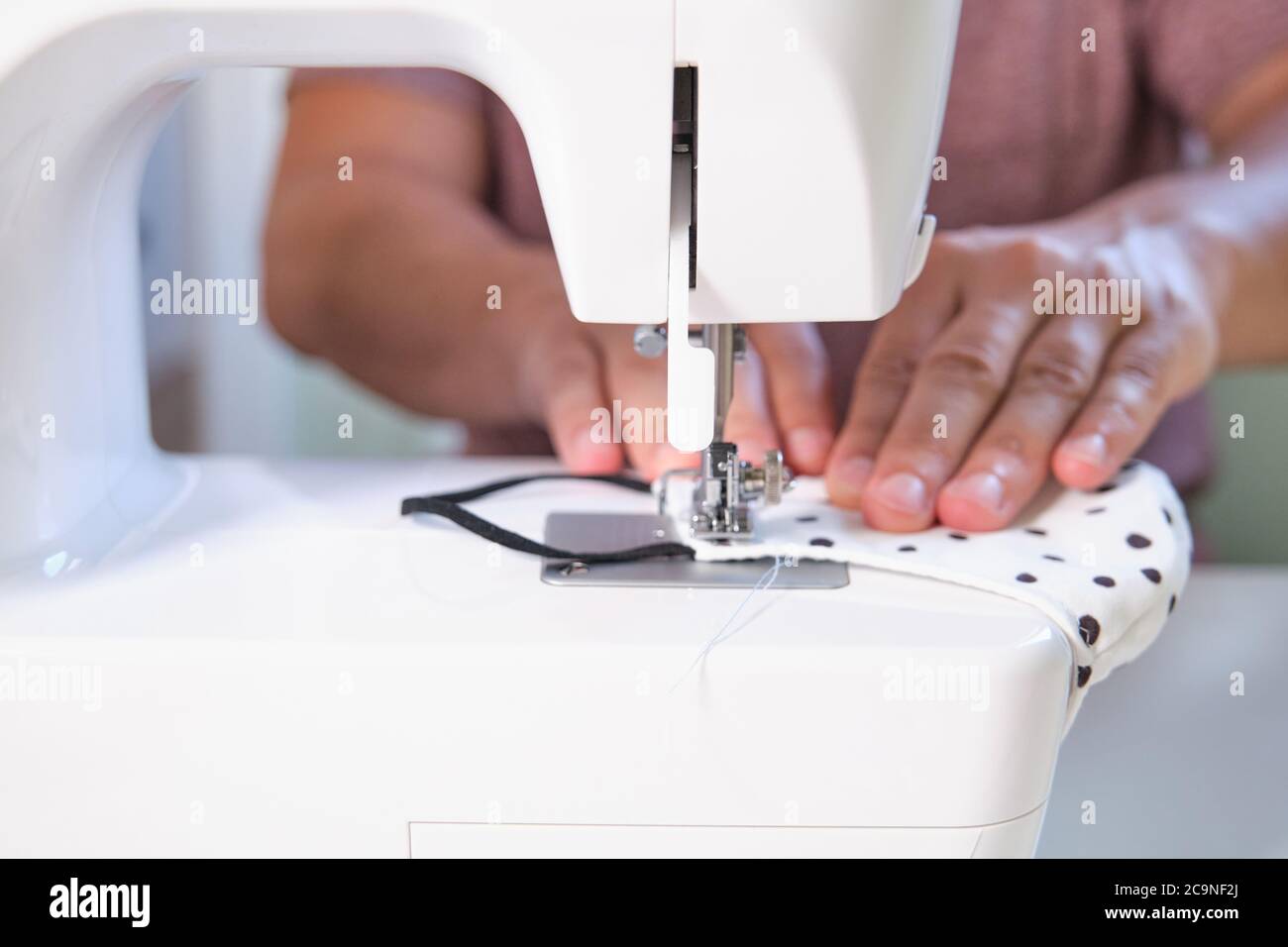 Man face mask sewing machine hi-res stock photography and images - Alamy