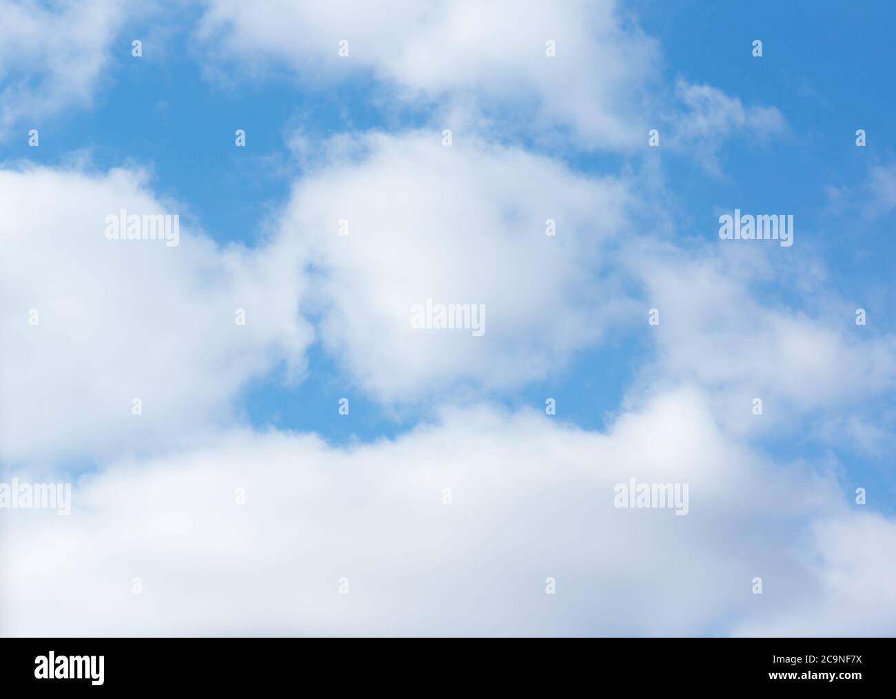 blue sky with flying white light clouds Stock Photo - Alamy