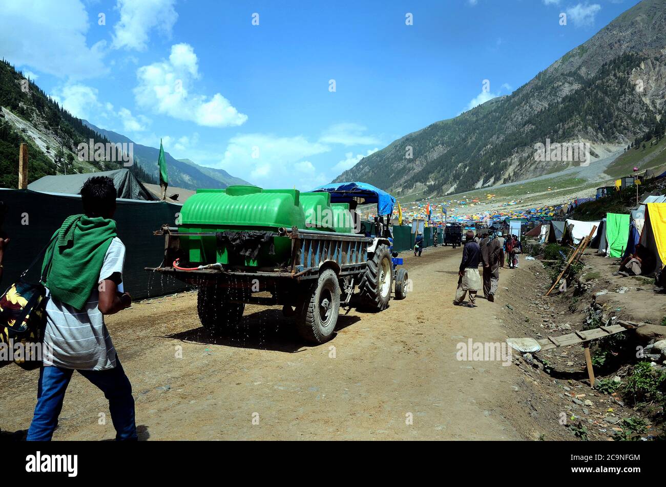 Hindu devotees visit during their pilgrimage from Baltal Base Camp to ...