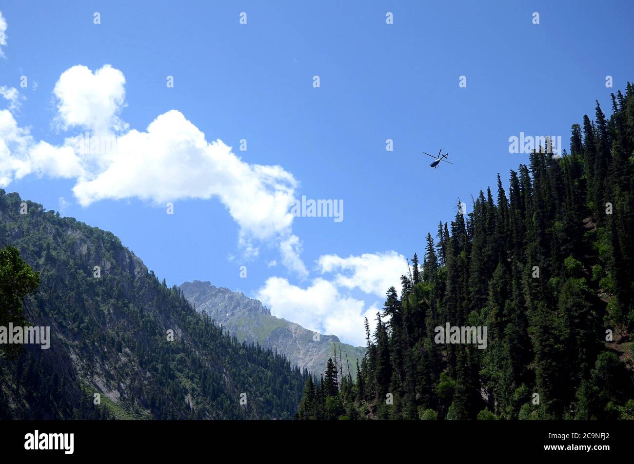 Hindu devotees visit during their pilgrimage from Baltal Base Camp to ...
