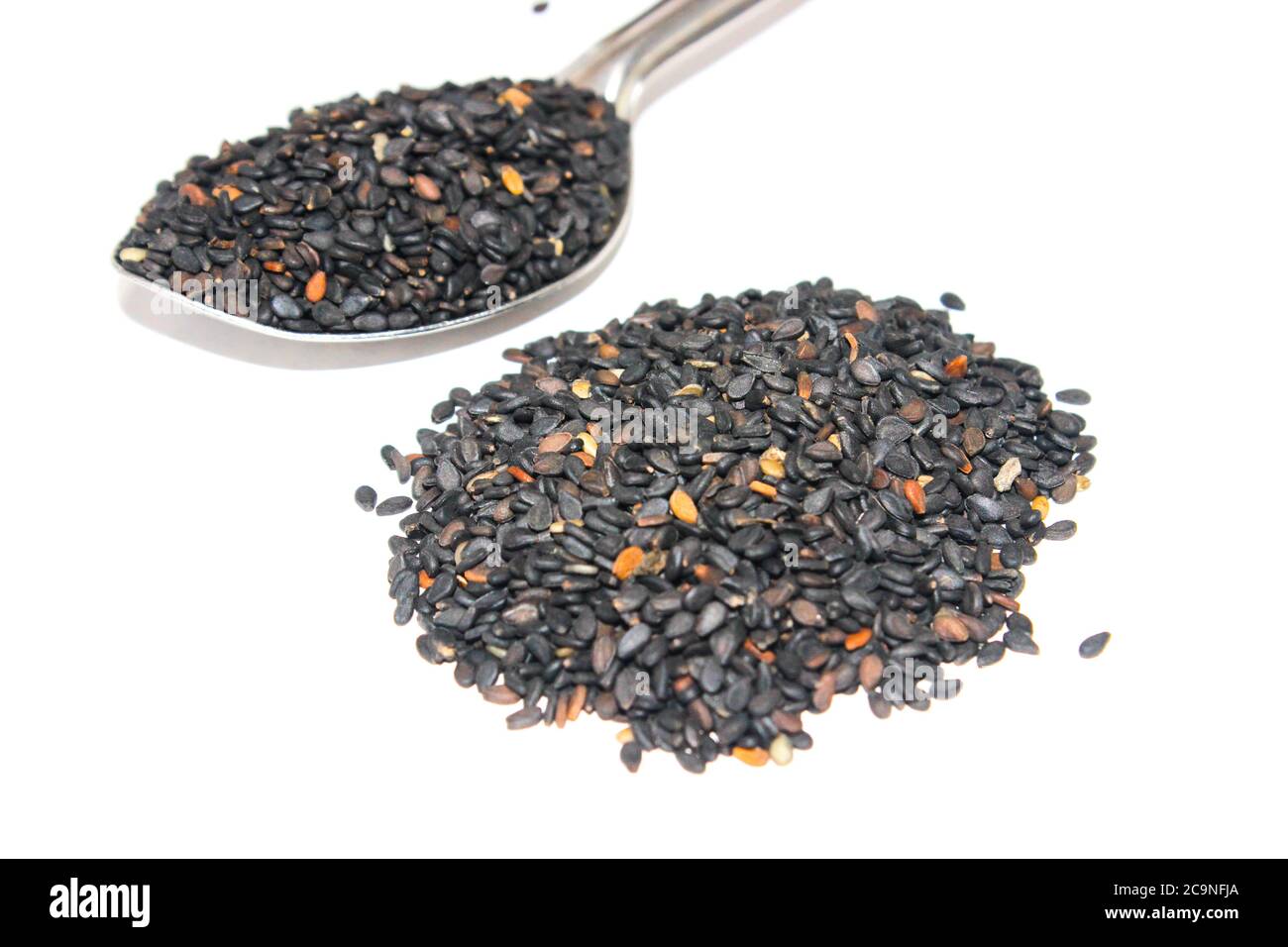 Heap black nigella seeds Cut Out Stock Images & Pictures - Alamy