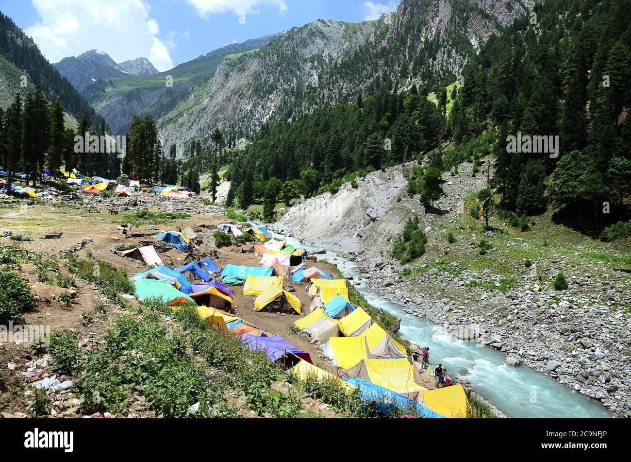 Hindu devotees visit during their pilgrimage from Baltal Base Camp to ...