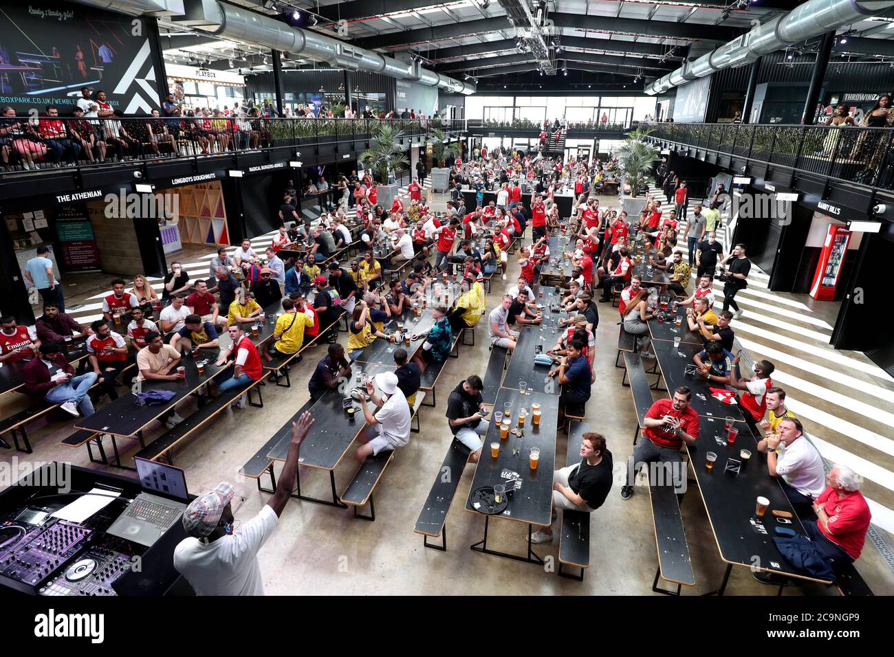 Fans gather at Box Park Wembley in London to watch the FA Cup final ...