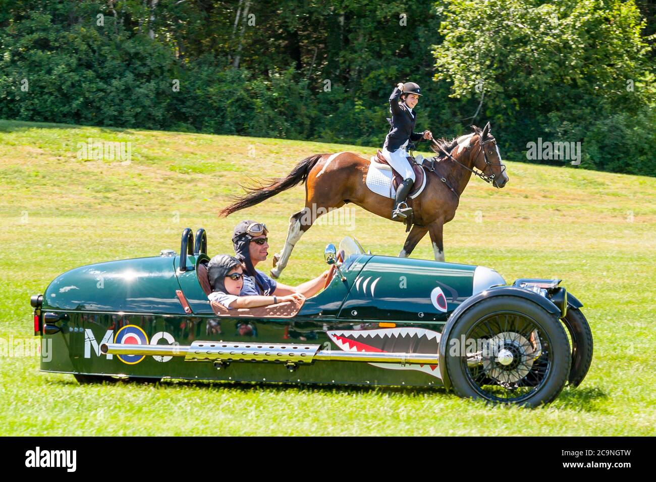 Morgan 3-Wheeler racing a horse at the Collings Foundation's Race of ...