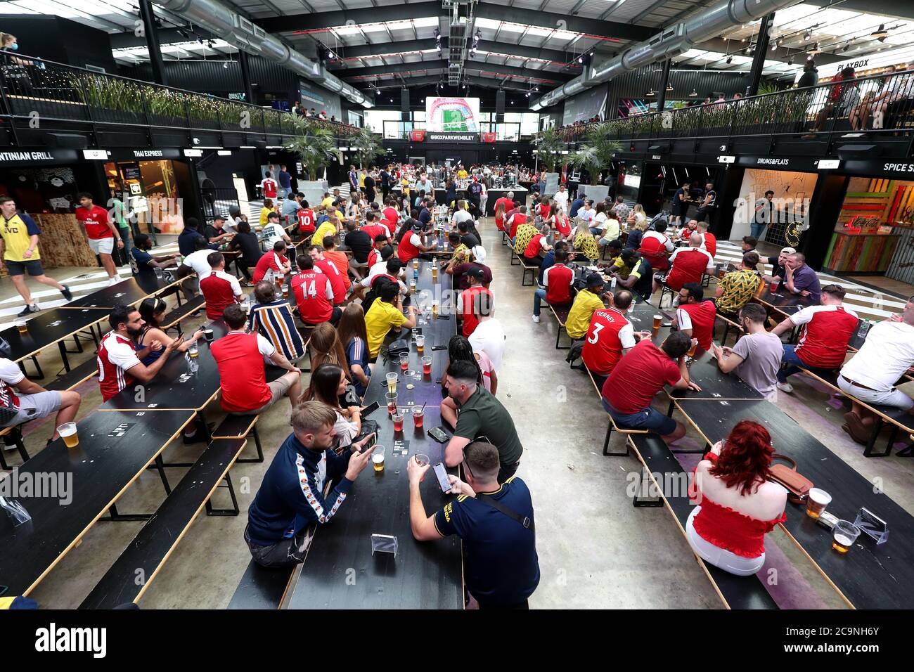 Fans at Box Park Wembley in London, as they watch the FA Cup final ...
