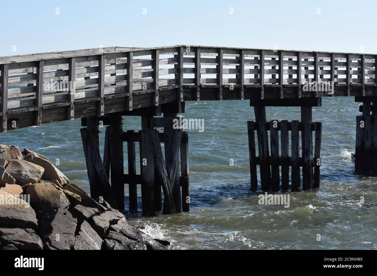 Wood foot bridge over the ocean in Plymouth, Massachusetts Stock Photo ...
