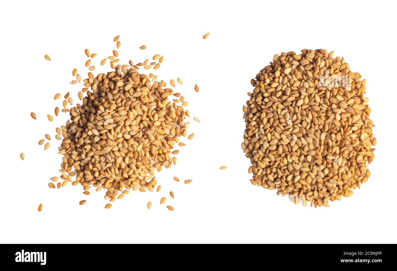 Macro shot of a raw white sesame seed isolated on white background. Top ...