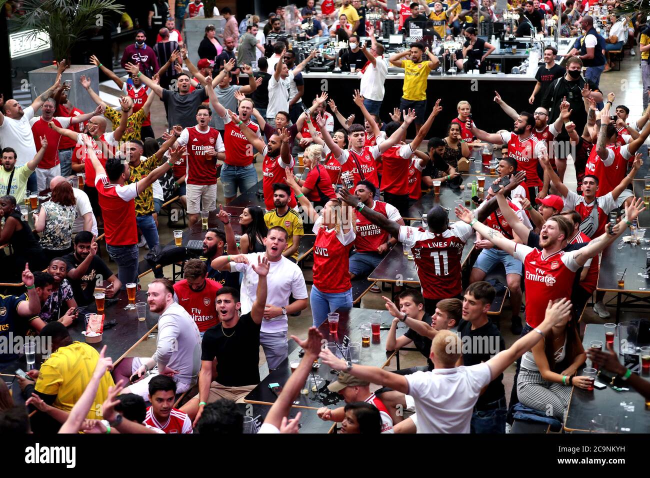Arsenal fans celebrate at Box Park Wembley in London after Pierre ...