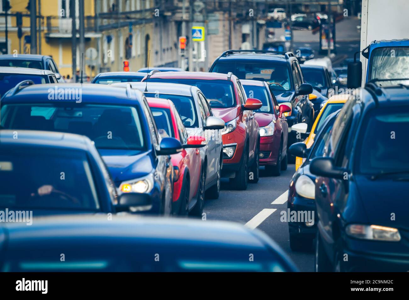 Cars standing in a queue during rush hour Stock Photo - Alamy