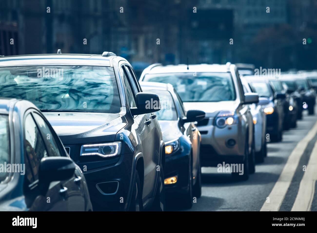 Cars standing in a line during traffic jam Stock Photo - Alamy