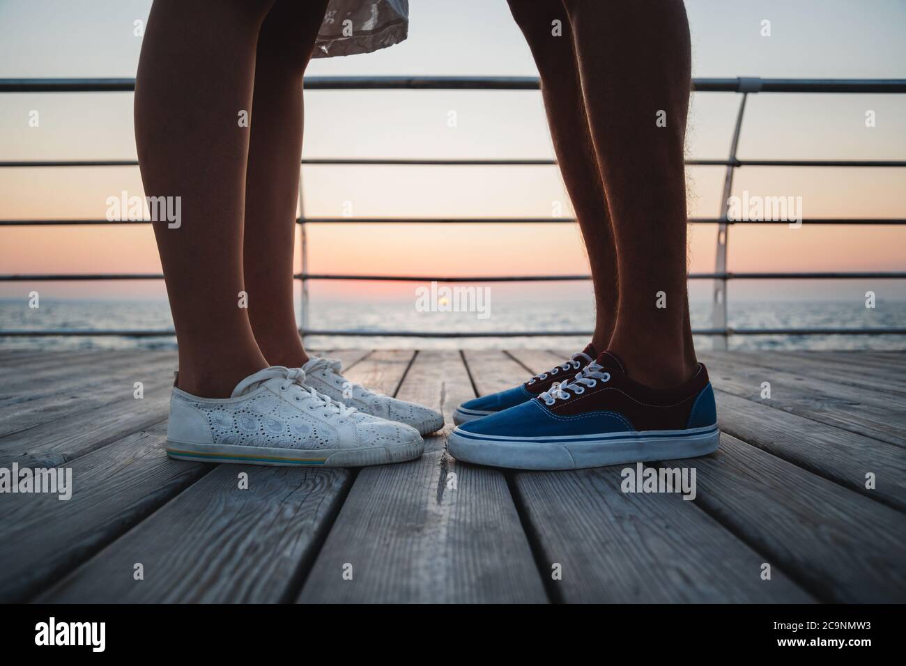 Silhouette standing feet together hi-res stock photography and images ...