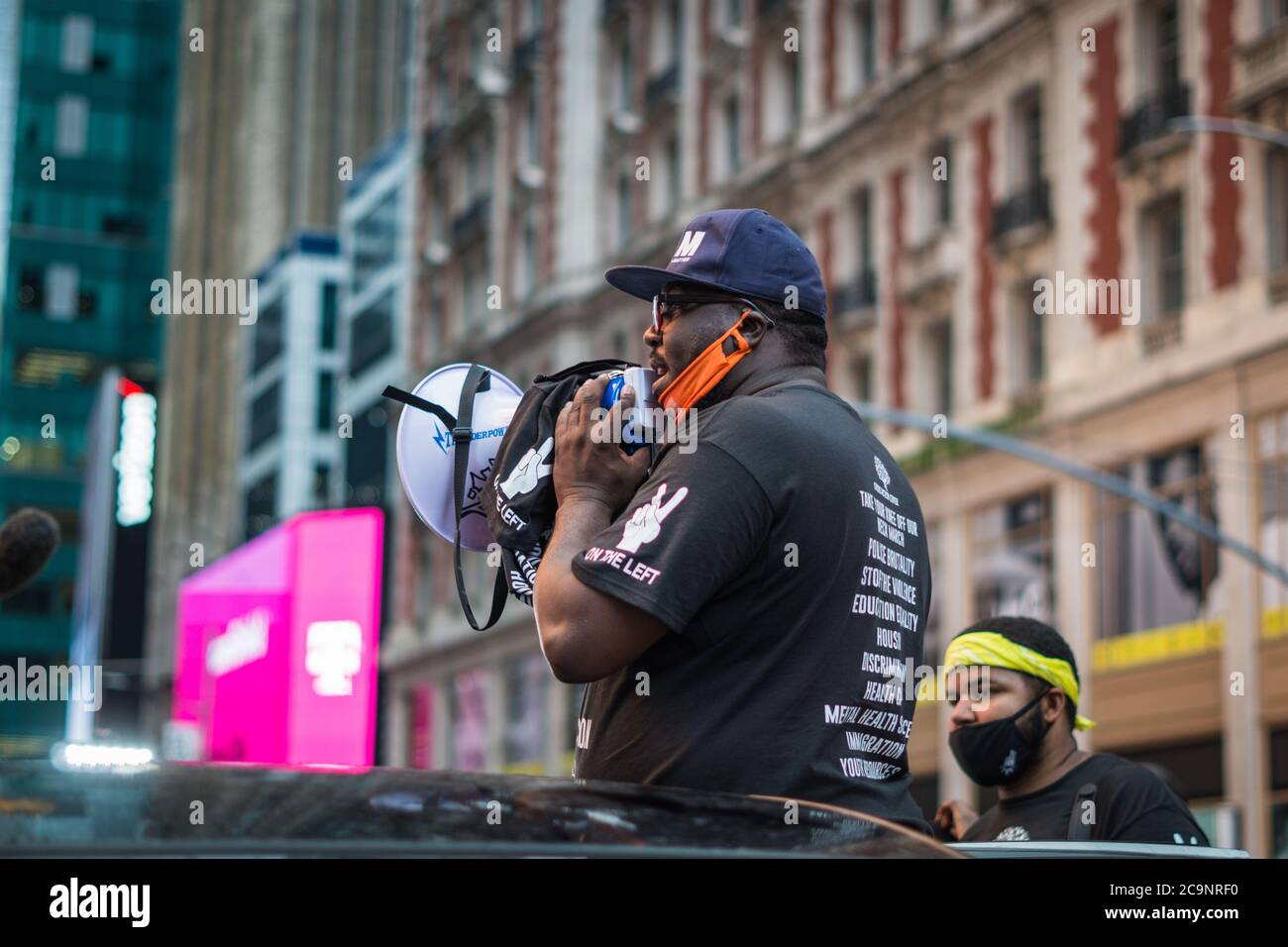Rev. Kevin McCall and the Crisis Action Center lead a march from Times ...