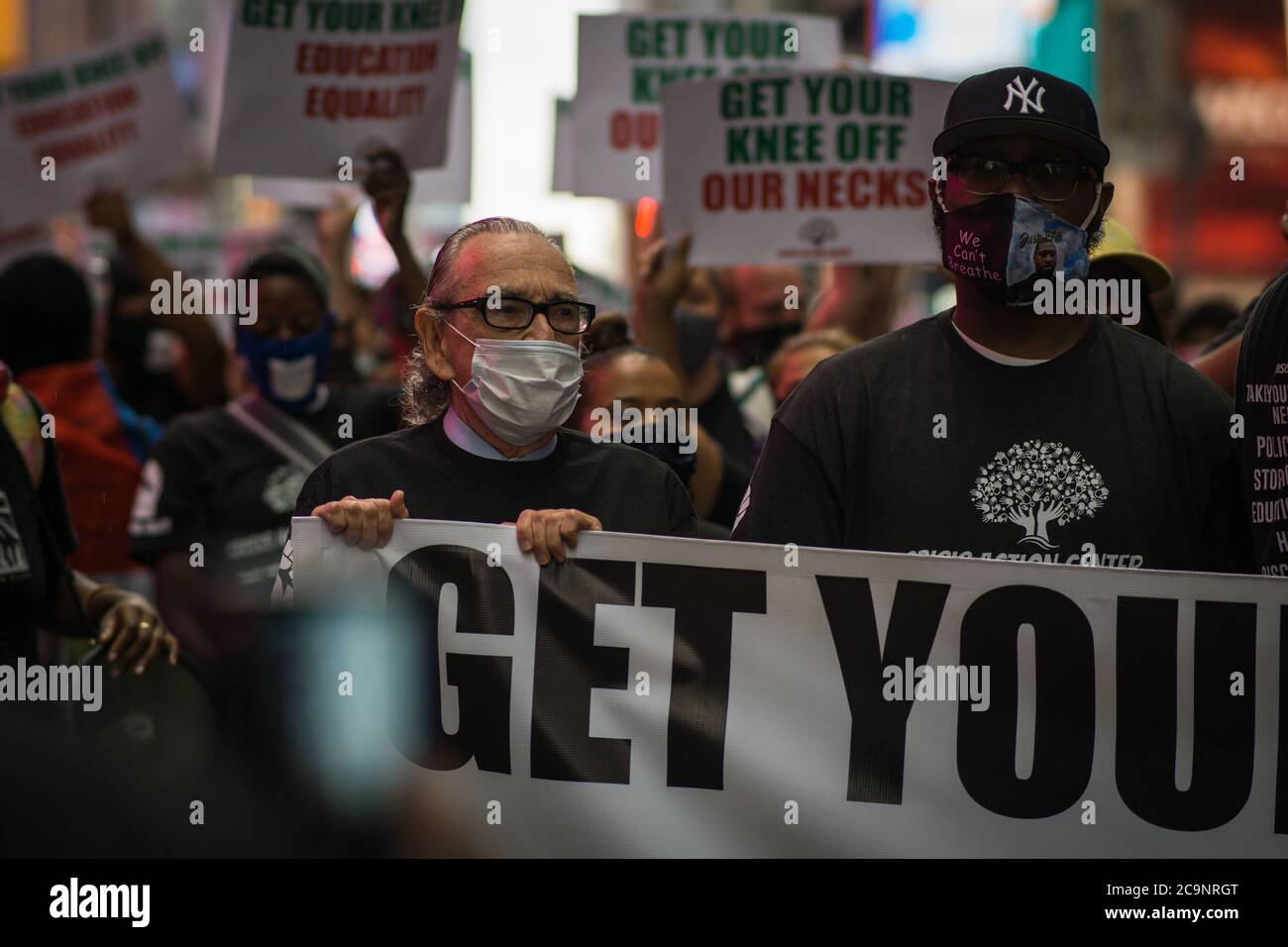 Rev. Kevin McCall and the Crisis Action Center lead a march from Times ...
