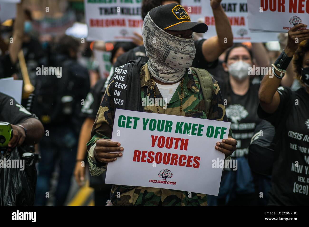 Rev. Kevin McCall and the Crisis Action Center lead a march from Times ...