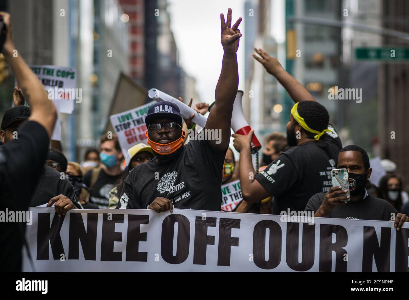 Rev. Kevin McCall and the Crisis Action Center lead a march from Times ...
