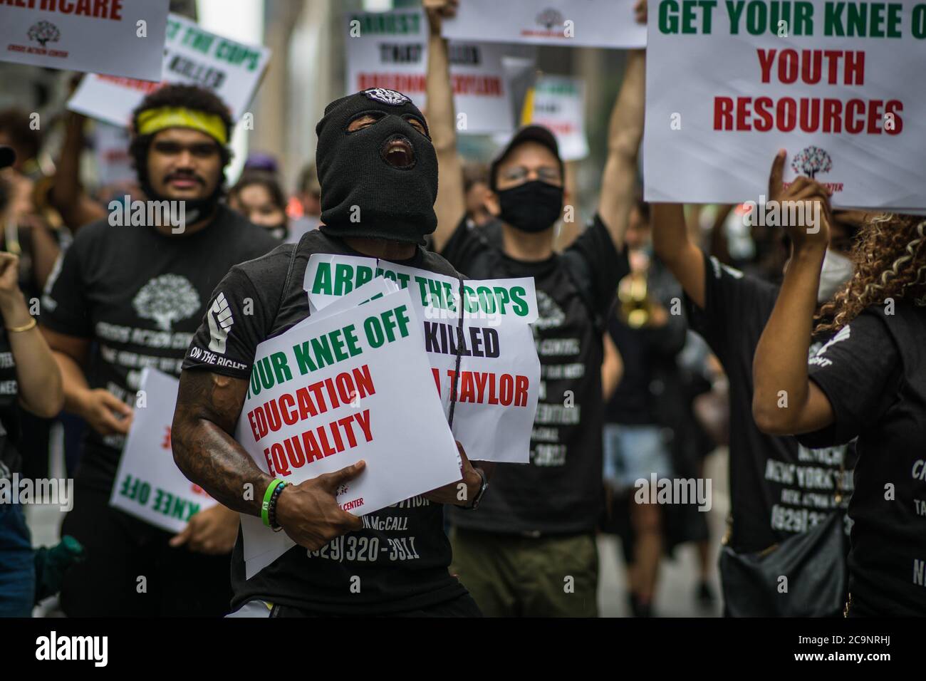 Rev. Kevin McCall and the Crisis Action Center lead a march from Times ...