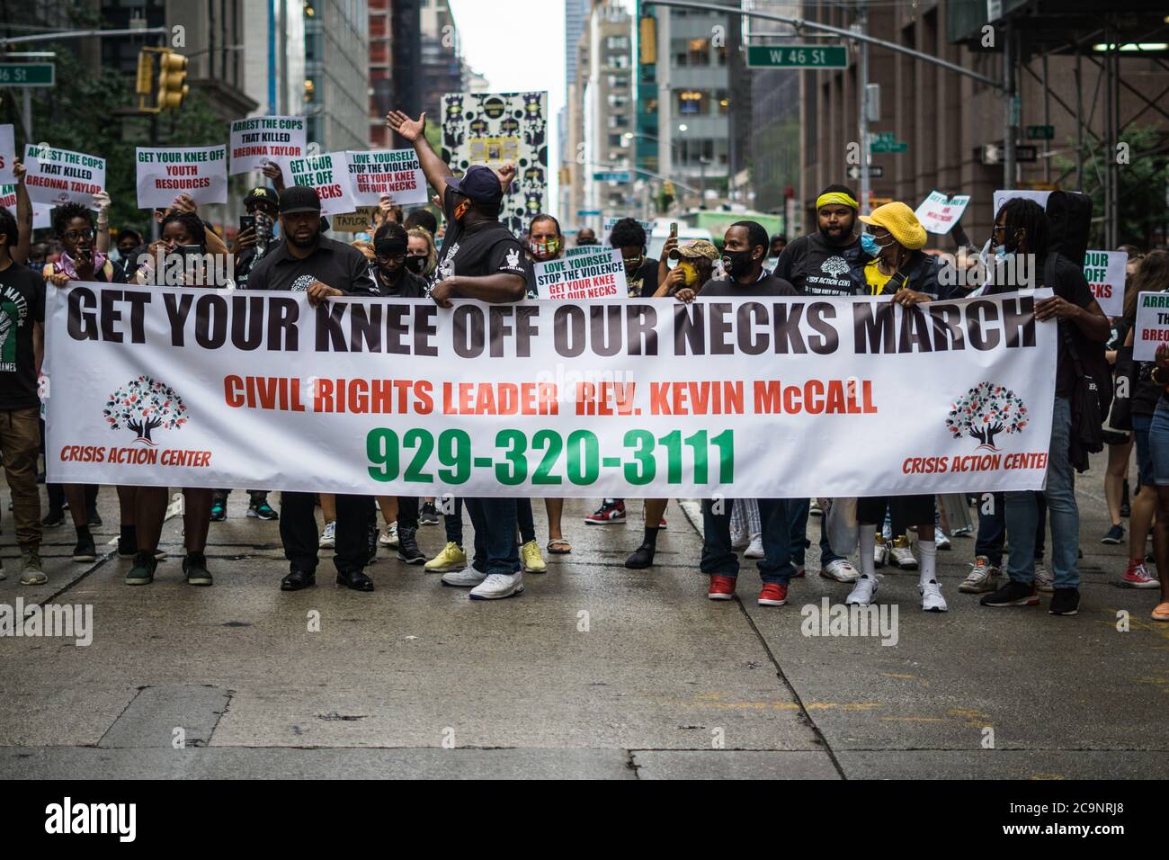 Rev. Kevin McCall and the Crisis Action Center lead a march from Times ...