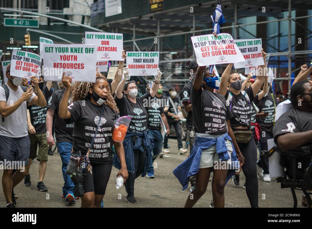 Rev. Kevin McCall and the Crisis Action Center lead a march from Times ...